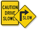 Slow Down, Drive Slowly Signs | Caution Slow Down Sign